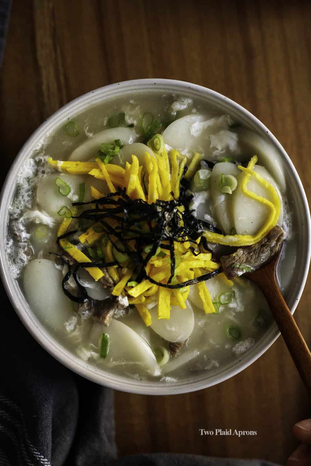 Easy Dduk Guk with Beef (Korean Rice Cake Soup) | Two Plaid Aprons